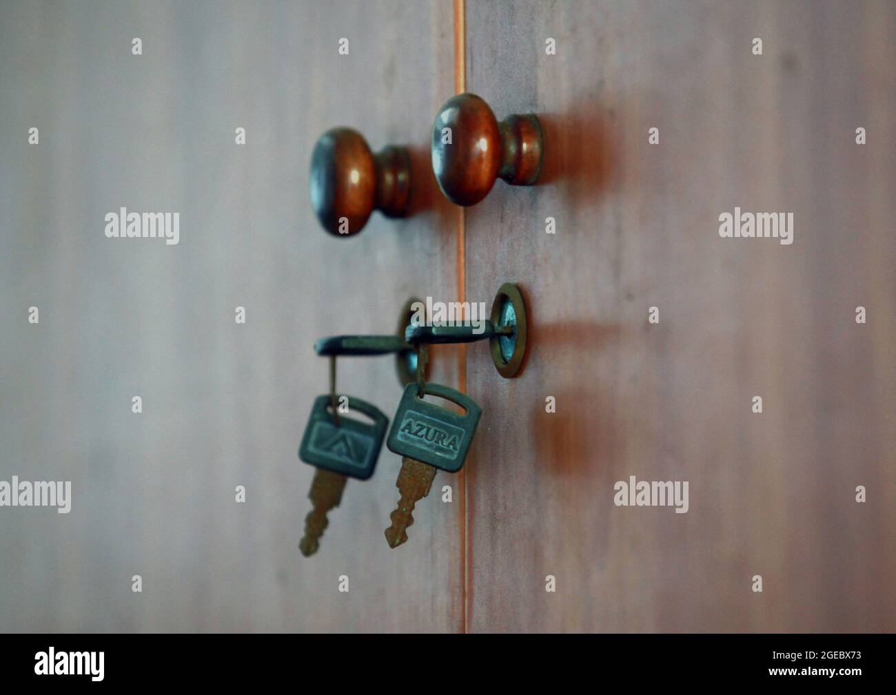 Jakarta, Indonesia-August 16, 2021: two keys hanging in the kitchen ...