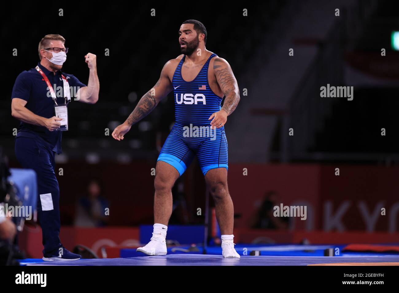 Gable Dan STEVESON (USA) (blue) celebrates victory in the Wrestling ...