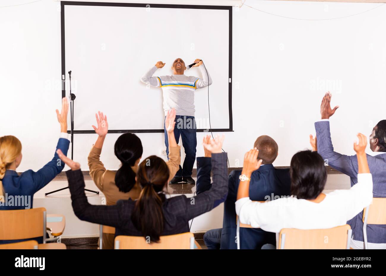 Male business executive giving speech hi-res stock photography and ...