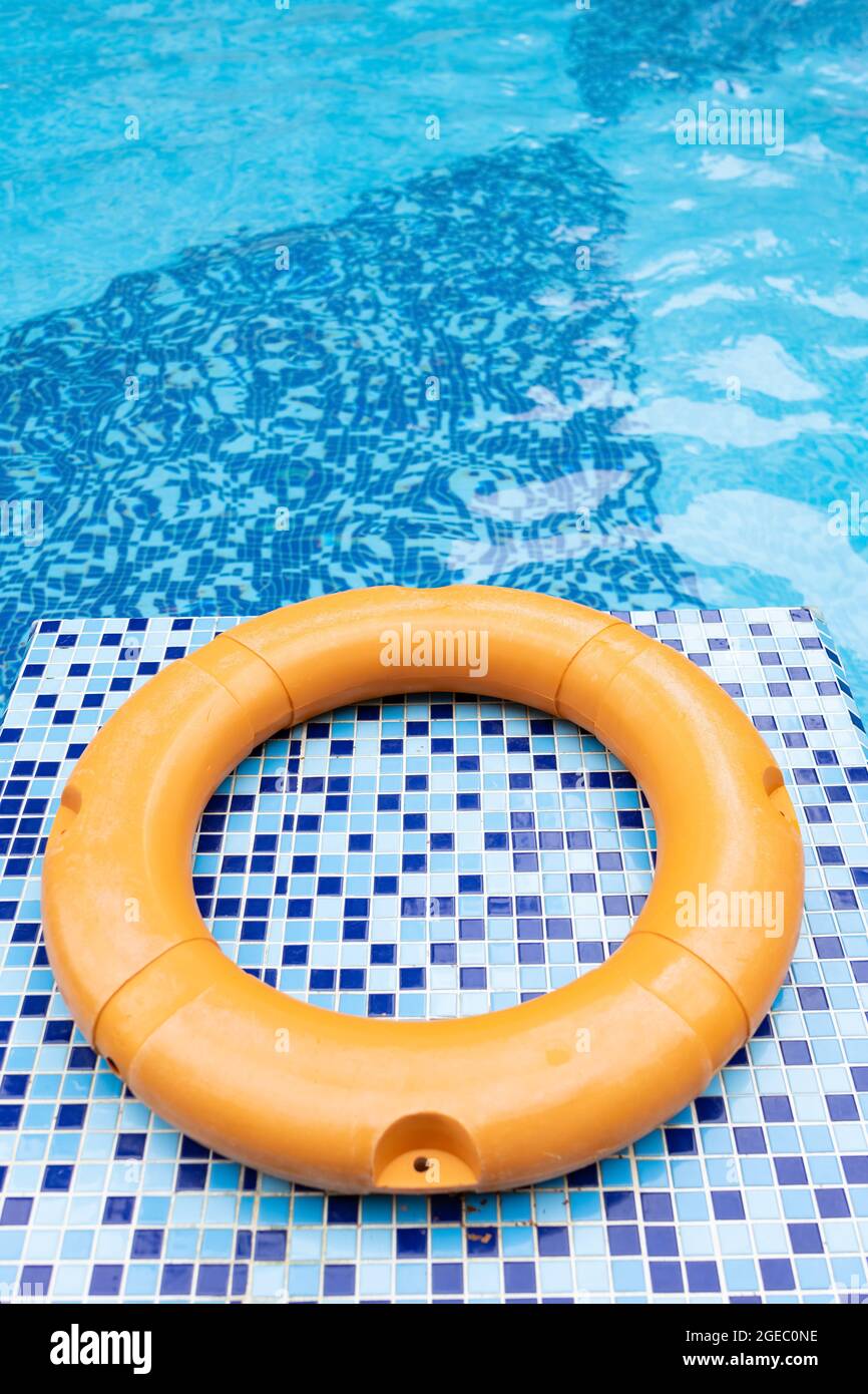 angle view buoy on the edge of an outside swimming pool vertical ...