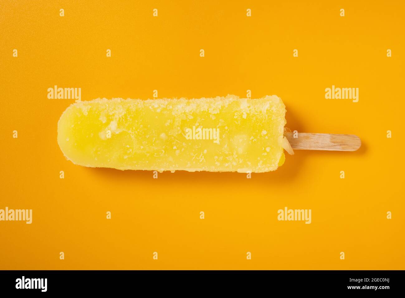 fresh yellow popsicle on a yellow background Stock Photo - Alamy