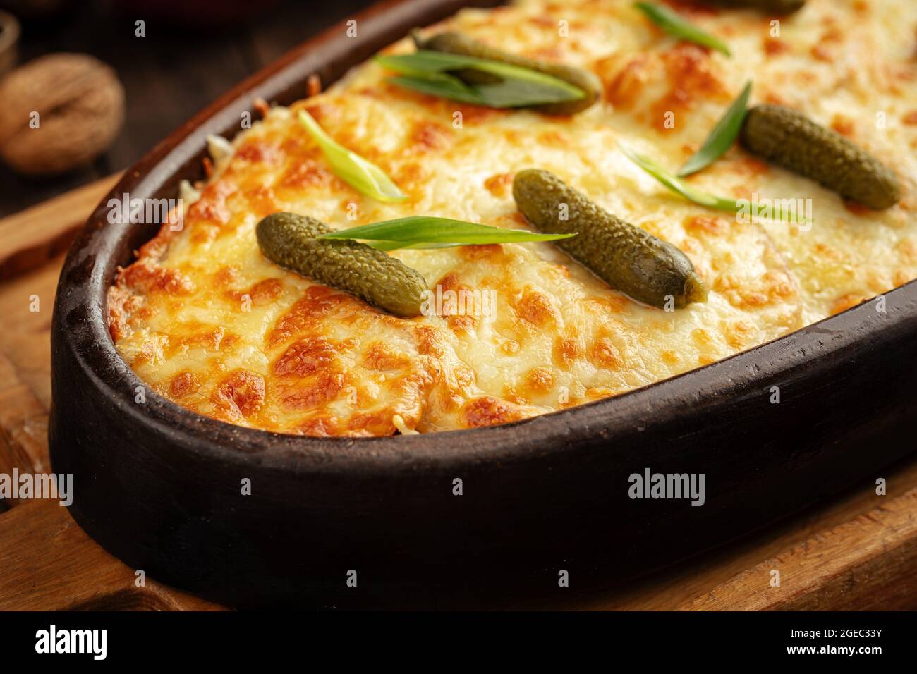 Georgian baked beef stew under cheese Stock Photo - Alamy