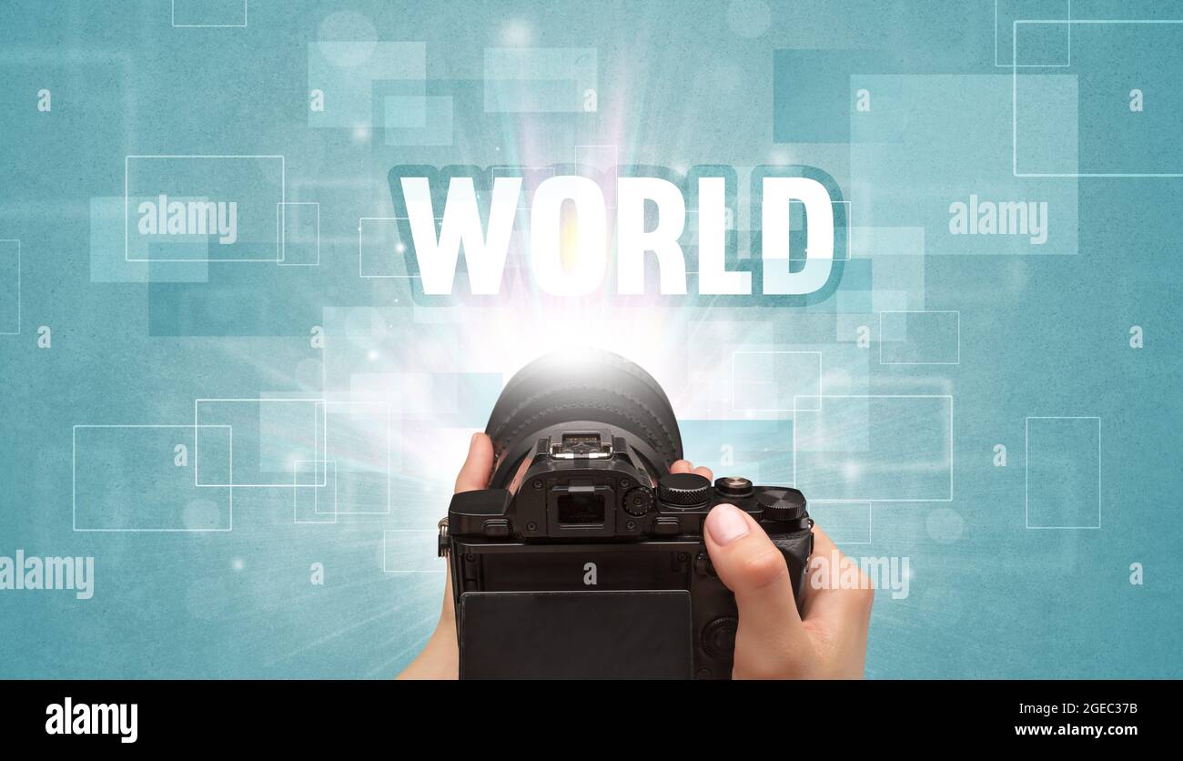 hand holding digital camera, traveling concept Stock Photo - Alamy