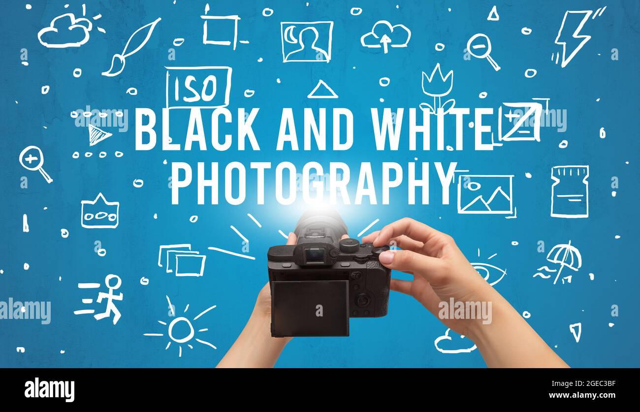 Hand taking picture with digital camera Stock Photo - Alamy