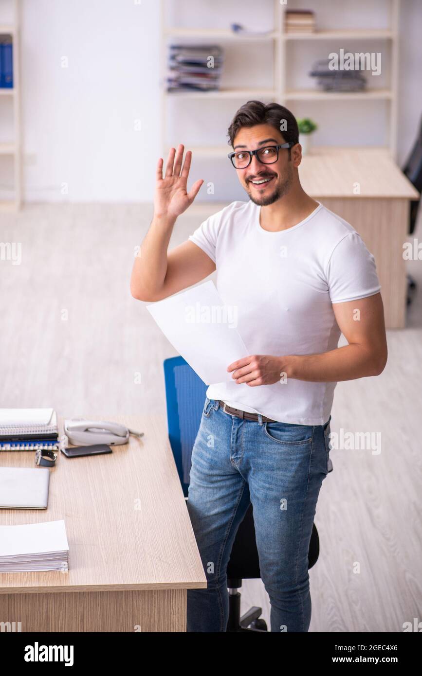 Young student employee at workplace Stock Photo - Alamy