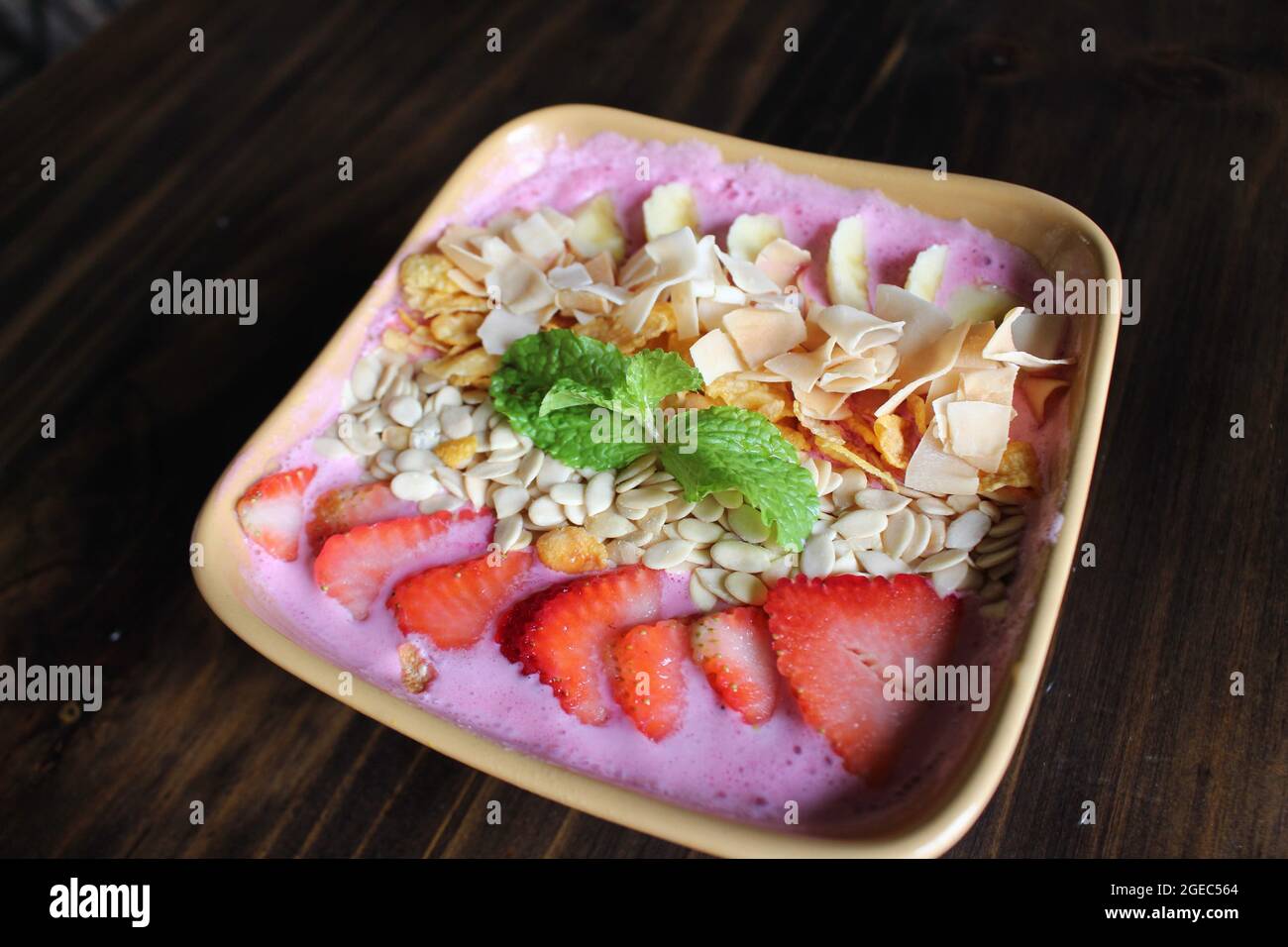 Light pink shaved coconut ice cream is a summer treat in the backyard ...