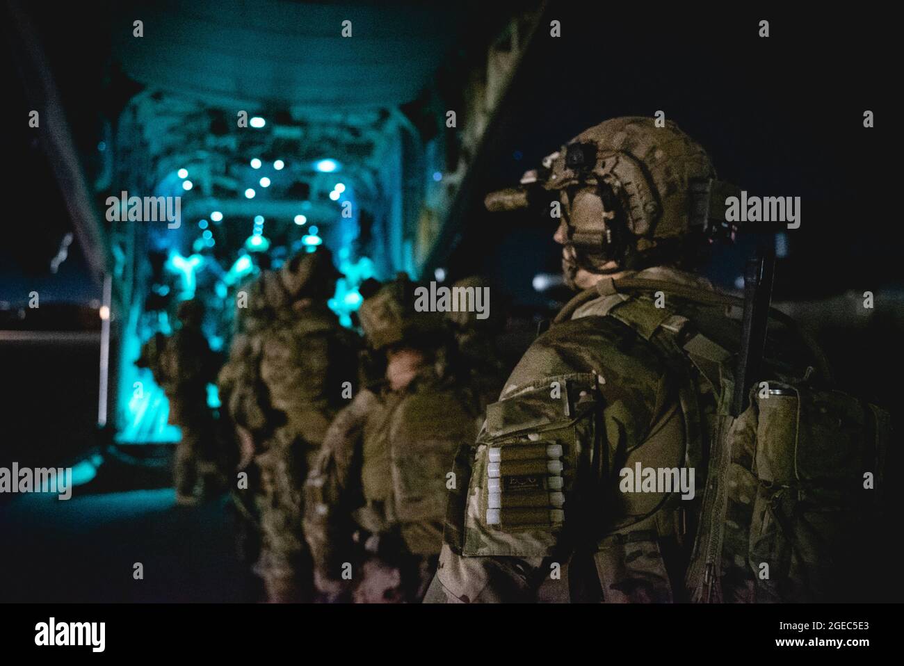 U.S. special operations service members conduct combat operations in ...