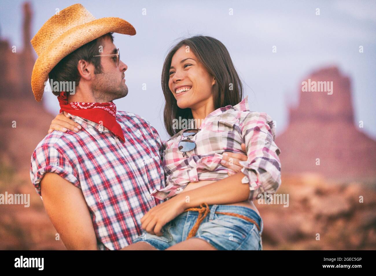 Lovers cowboy and cowgirl in love cute couple in USA backcountry ...