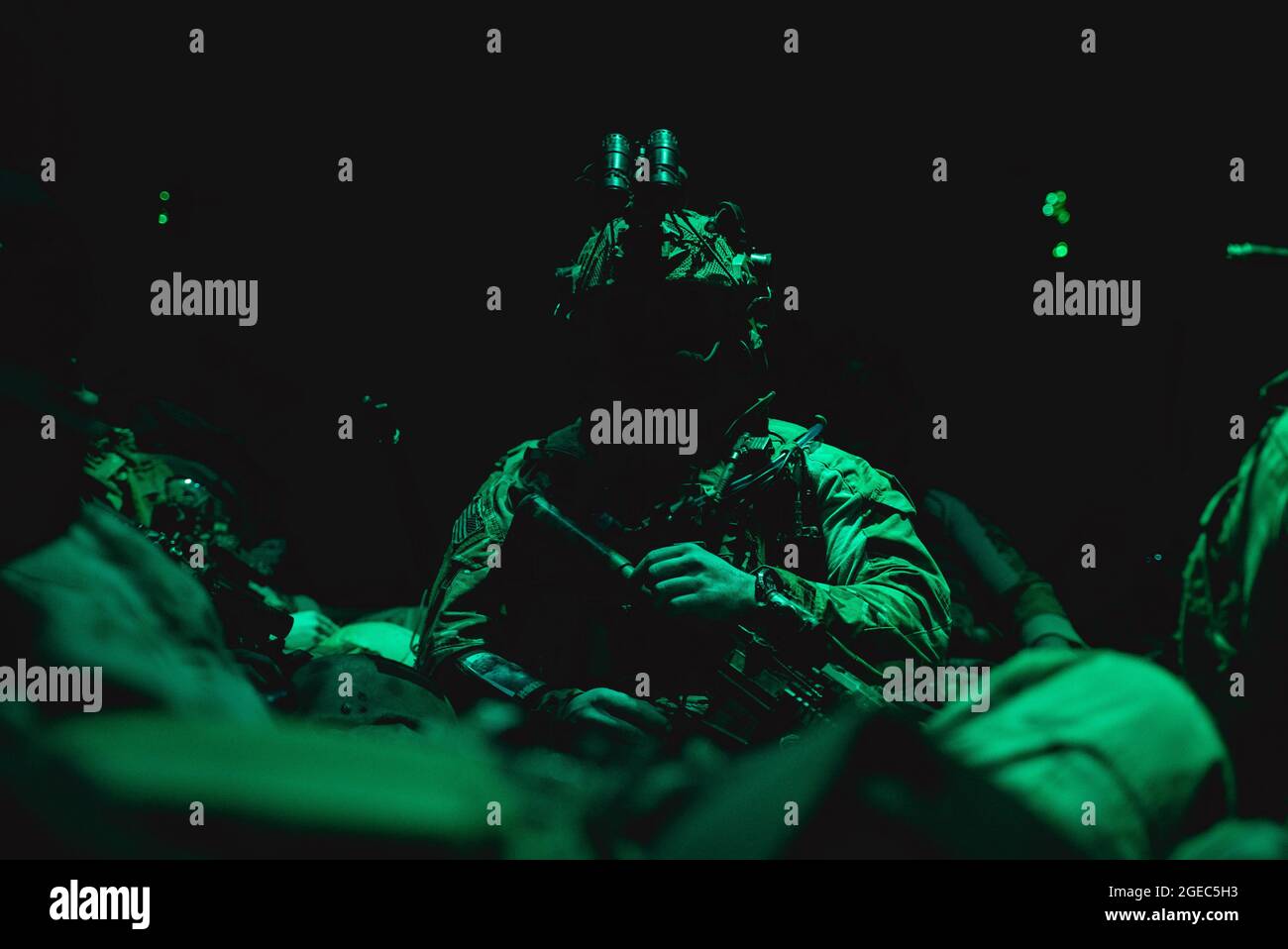 U.S. special operations service members conduct combat operations in ...