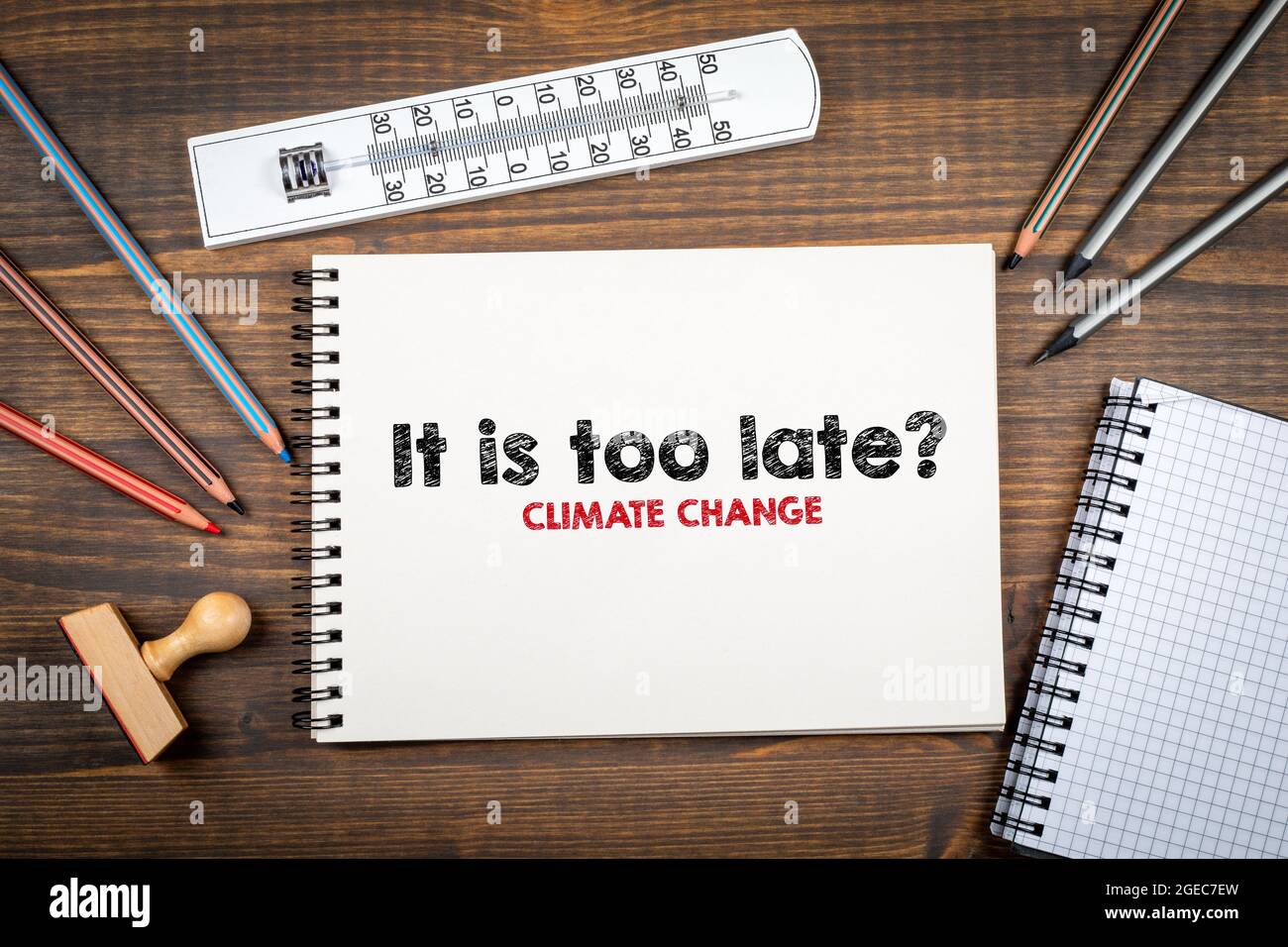 Climate Change. Air temperature thermometer and office supplies on a ...