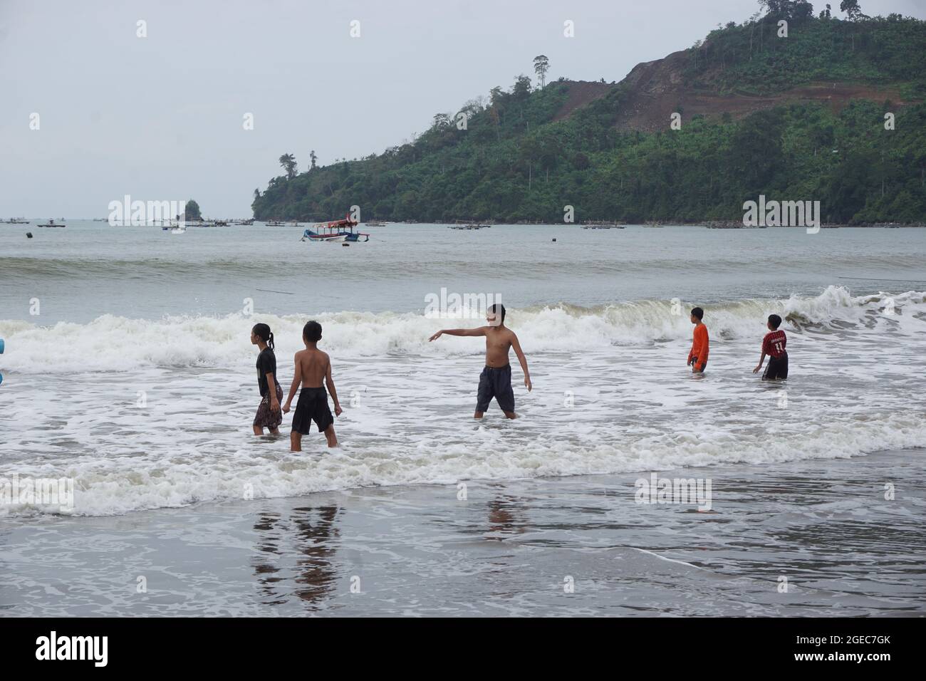 People vacation on Gemah Beach, Tulung Agung, East Java Indonesia Stock ...