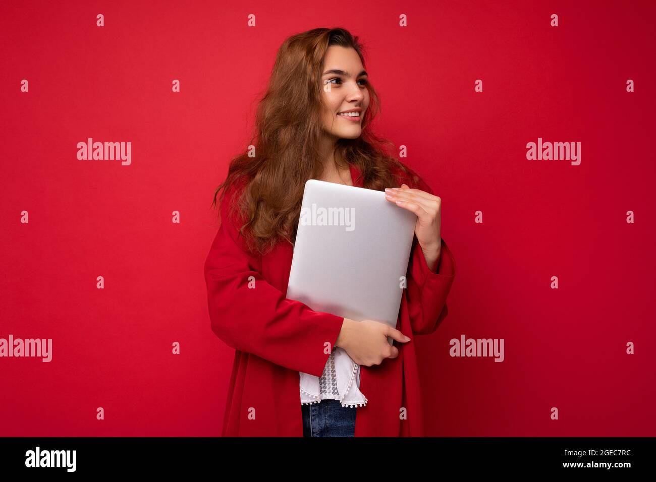 side profile photo of charming pretty young lady holding laptop ...