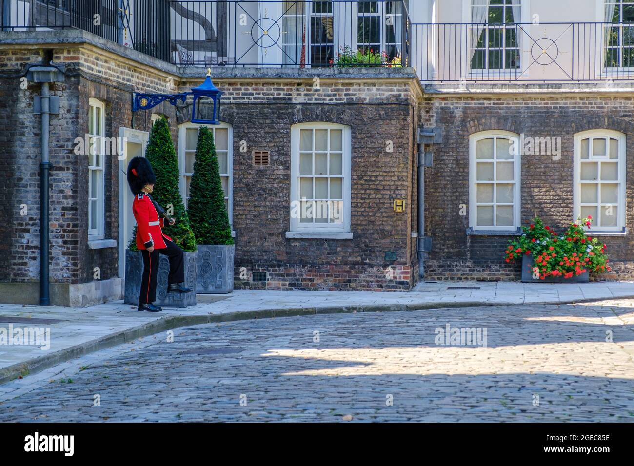 Staycation idea. Coldstream Guards sentry in military dress holding a ...