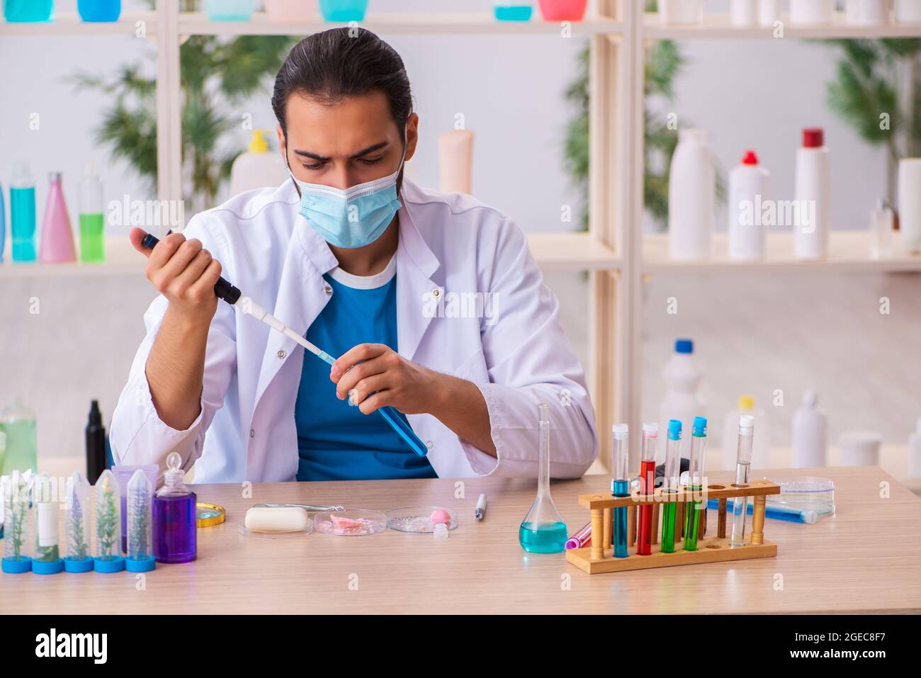 Young chemist testing soap in the lab Stock Photo - Alamy