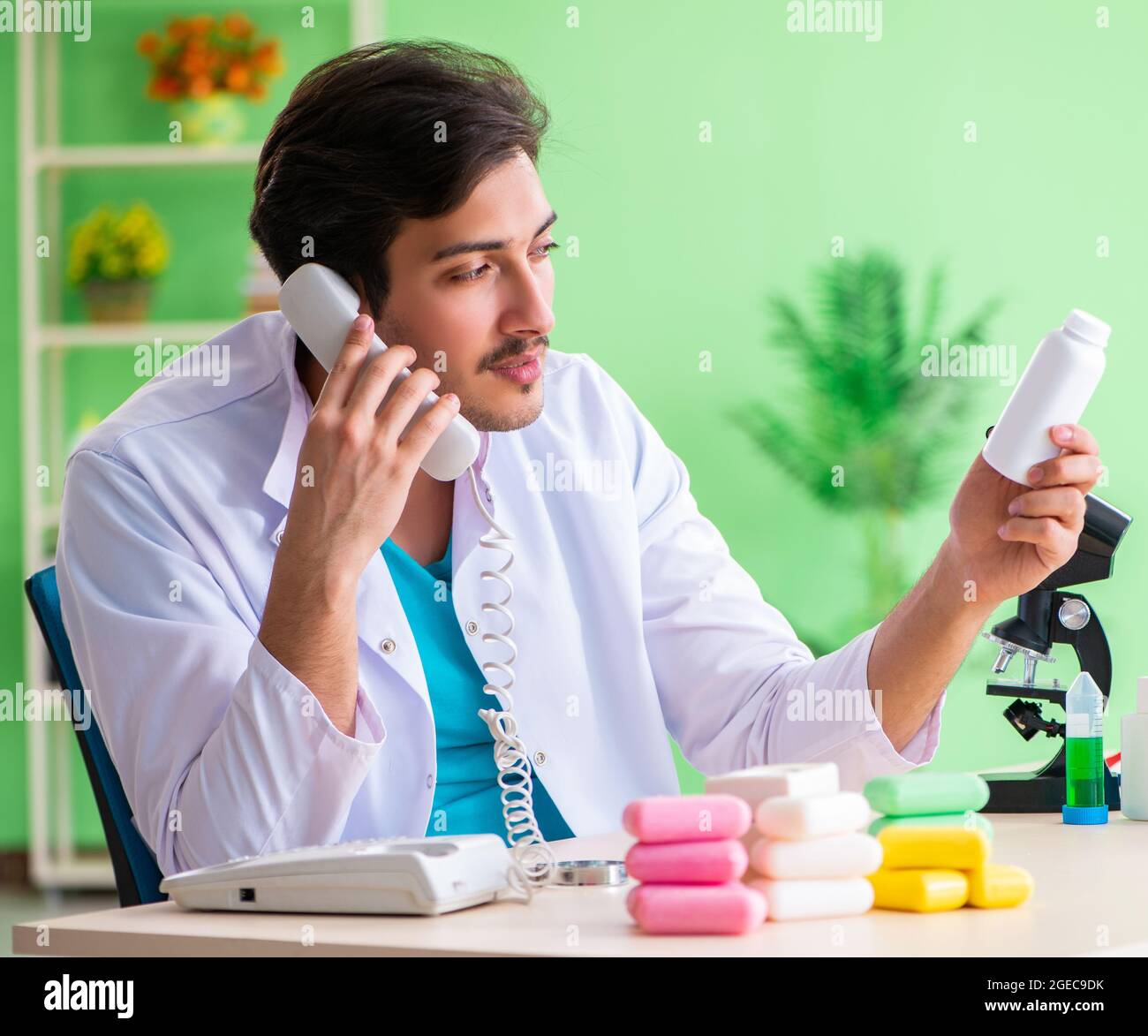 The chemist testing soap in the lab Stock Photo - Alamy