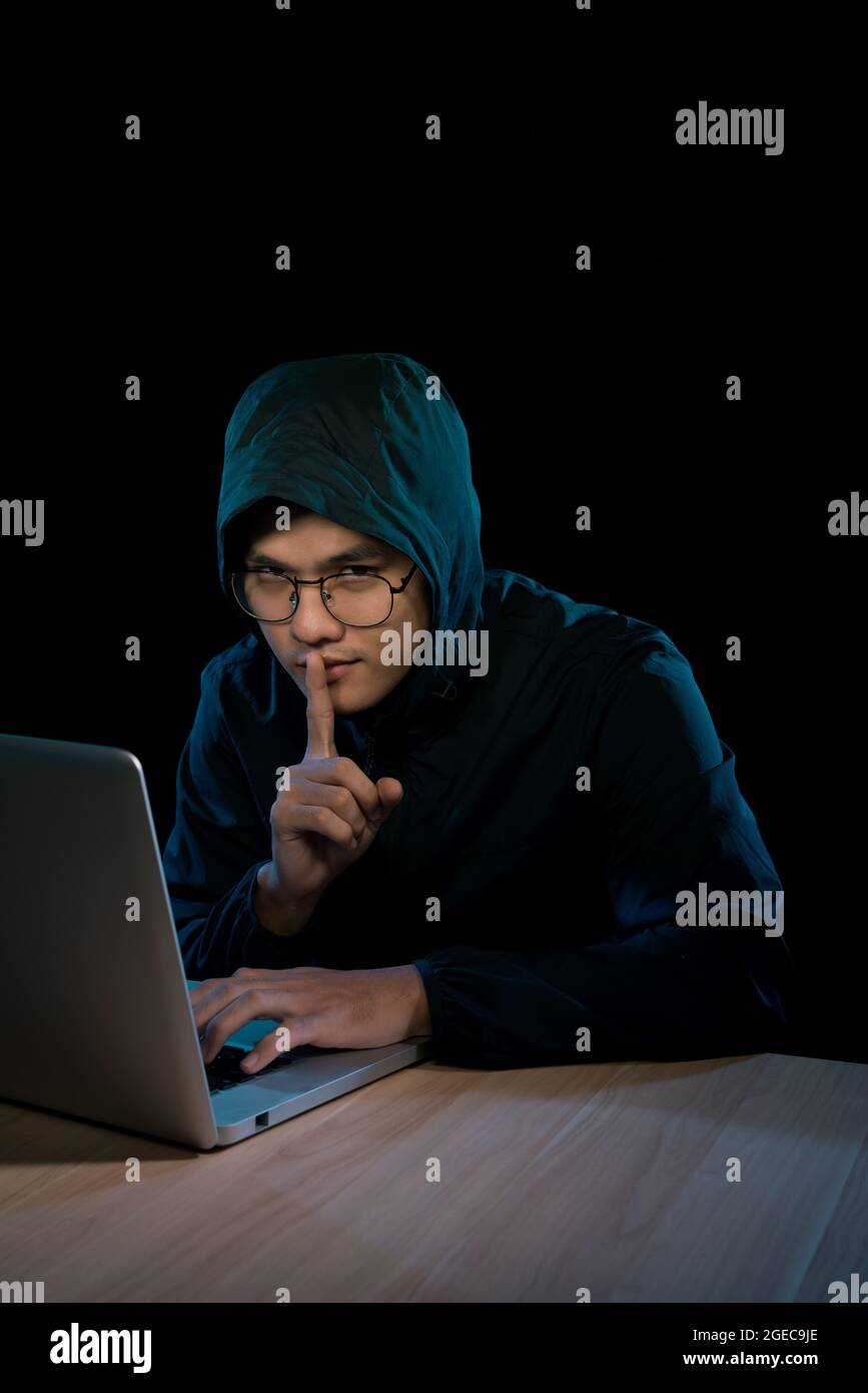 Hacker man computer in dark hi-res stock photography and images - Alamy
