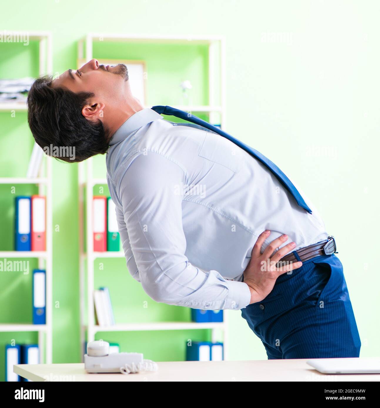 The employee doing exercises during break at work Stock Photo - Alamy