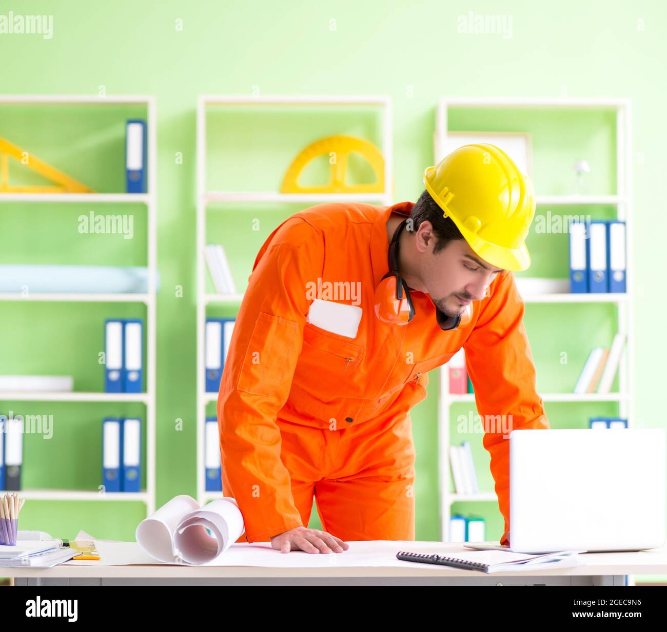 The construction supervisor planning new project in office Stock Photo ...