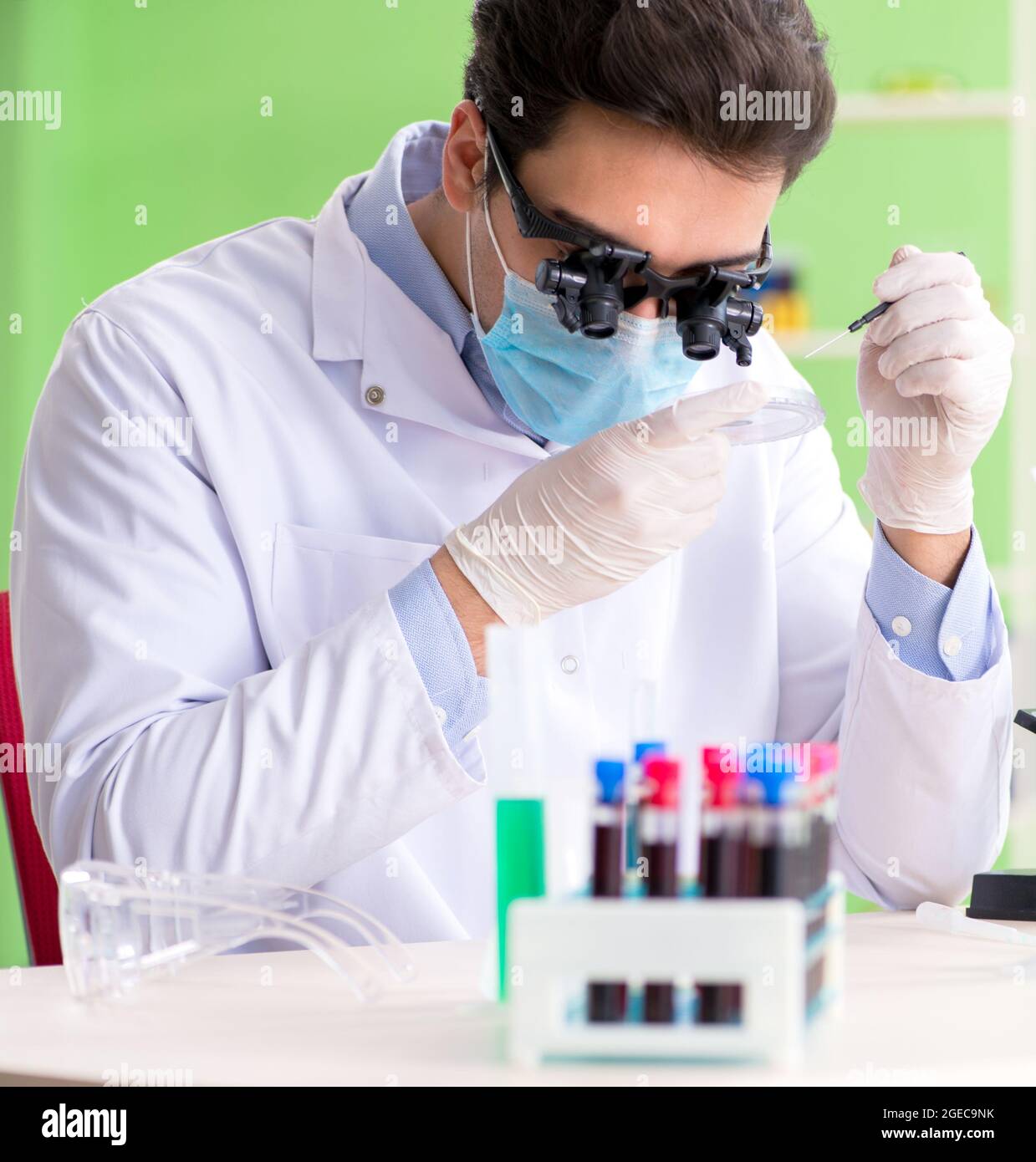 The man chemist working in the lab Stock Photo - Alamy