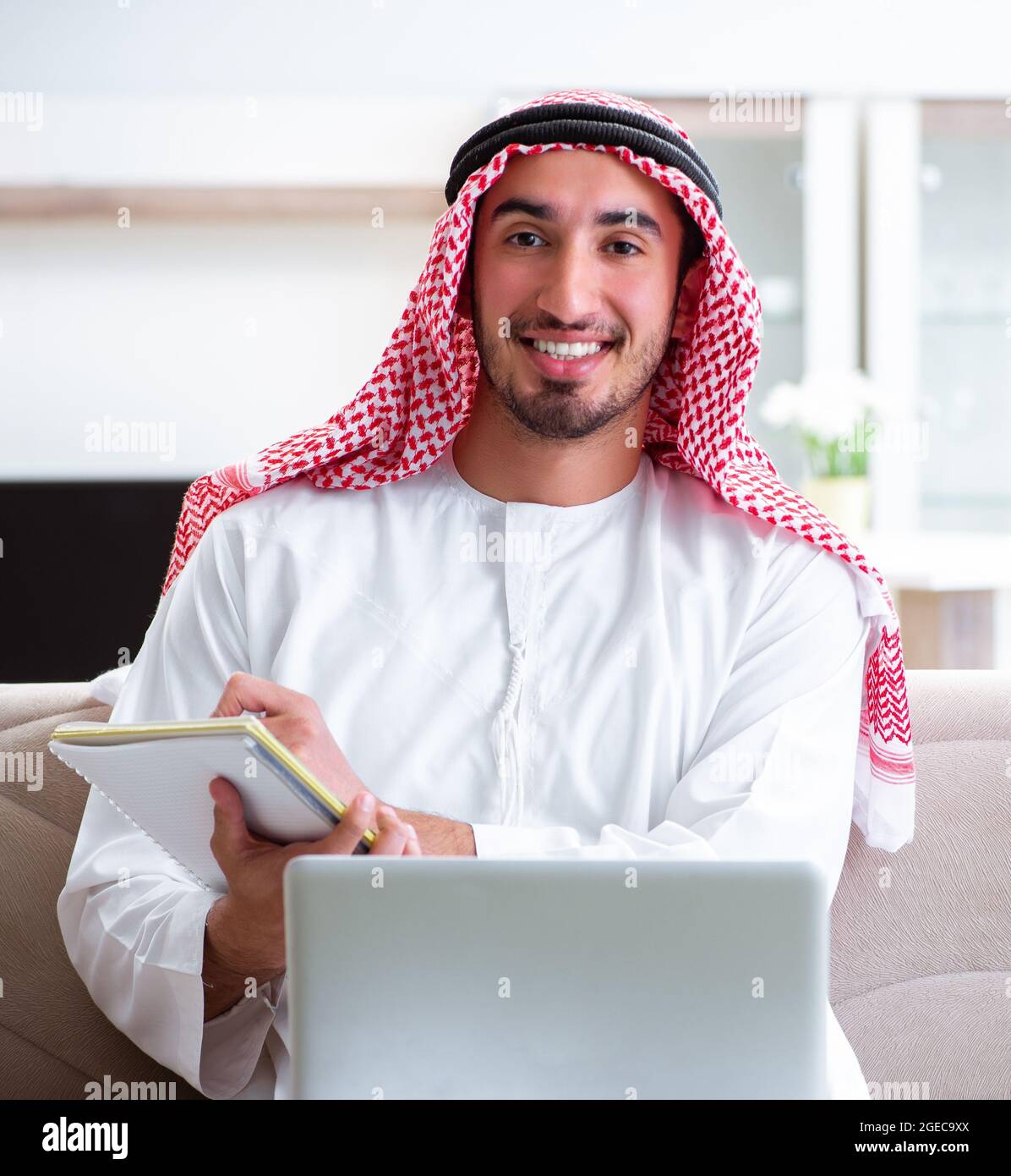 The arab man working at home on his work Stock Photo - Alamy