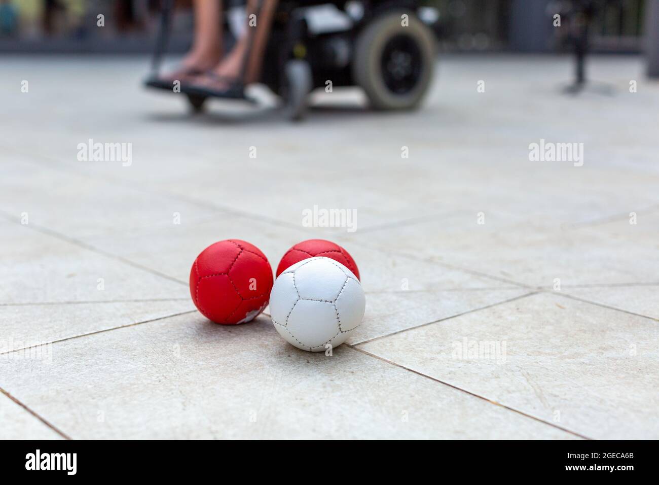 Disabled Boccia player playing on a wheelchair Stock Photo - Alamy