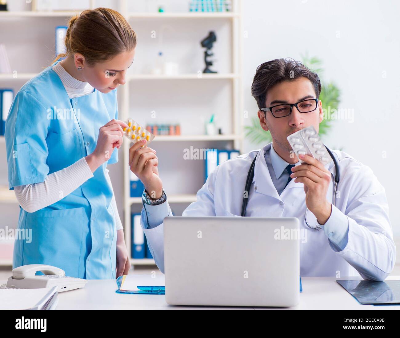 The male and female doctor having discussion in hospital Stock Photo ...