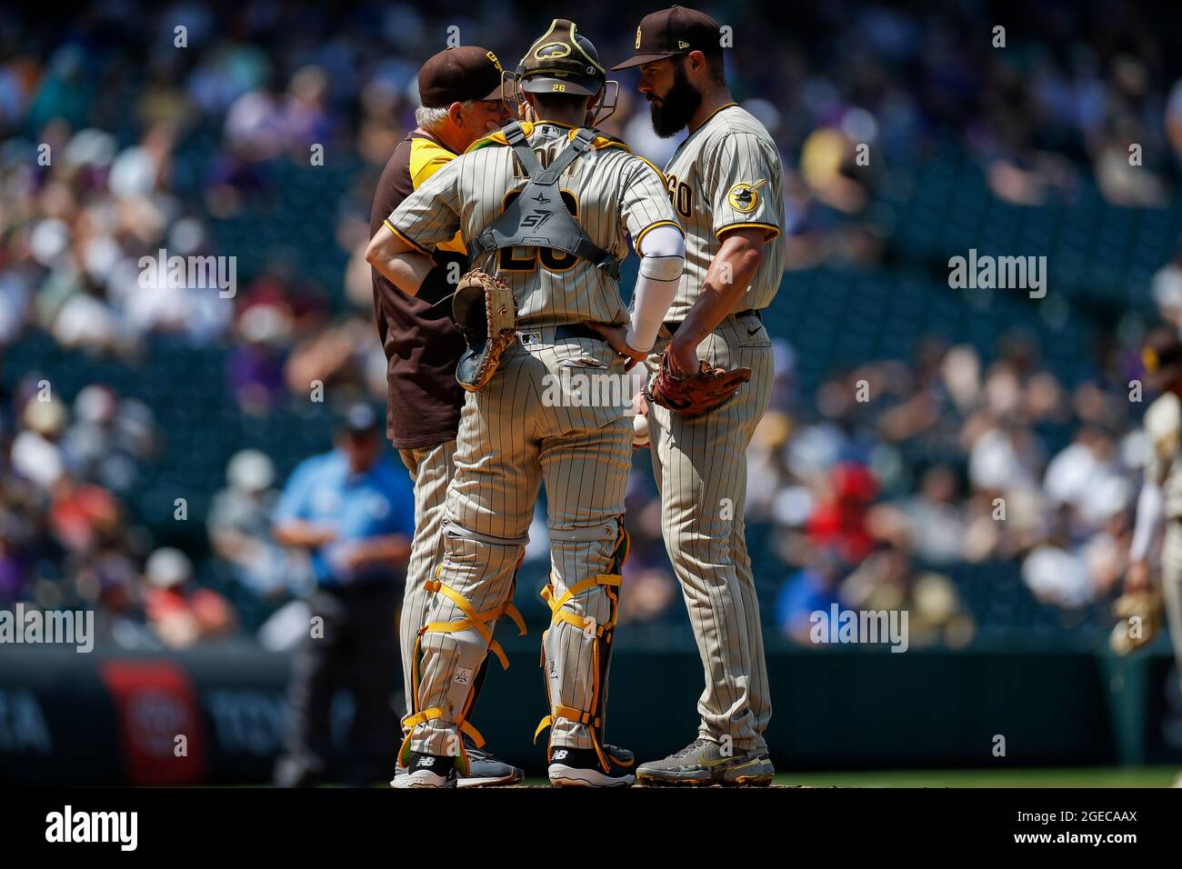 San Diego Padres pitcher Jake Arrieta (49) gets a visit from San Diego ...