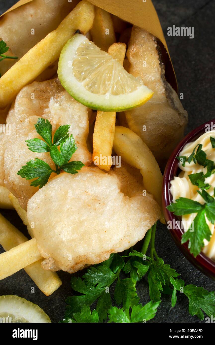 Street food, presentation of portion of cod and french fries Stock ...