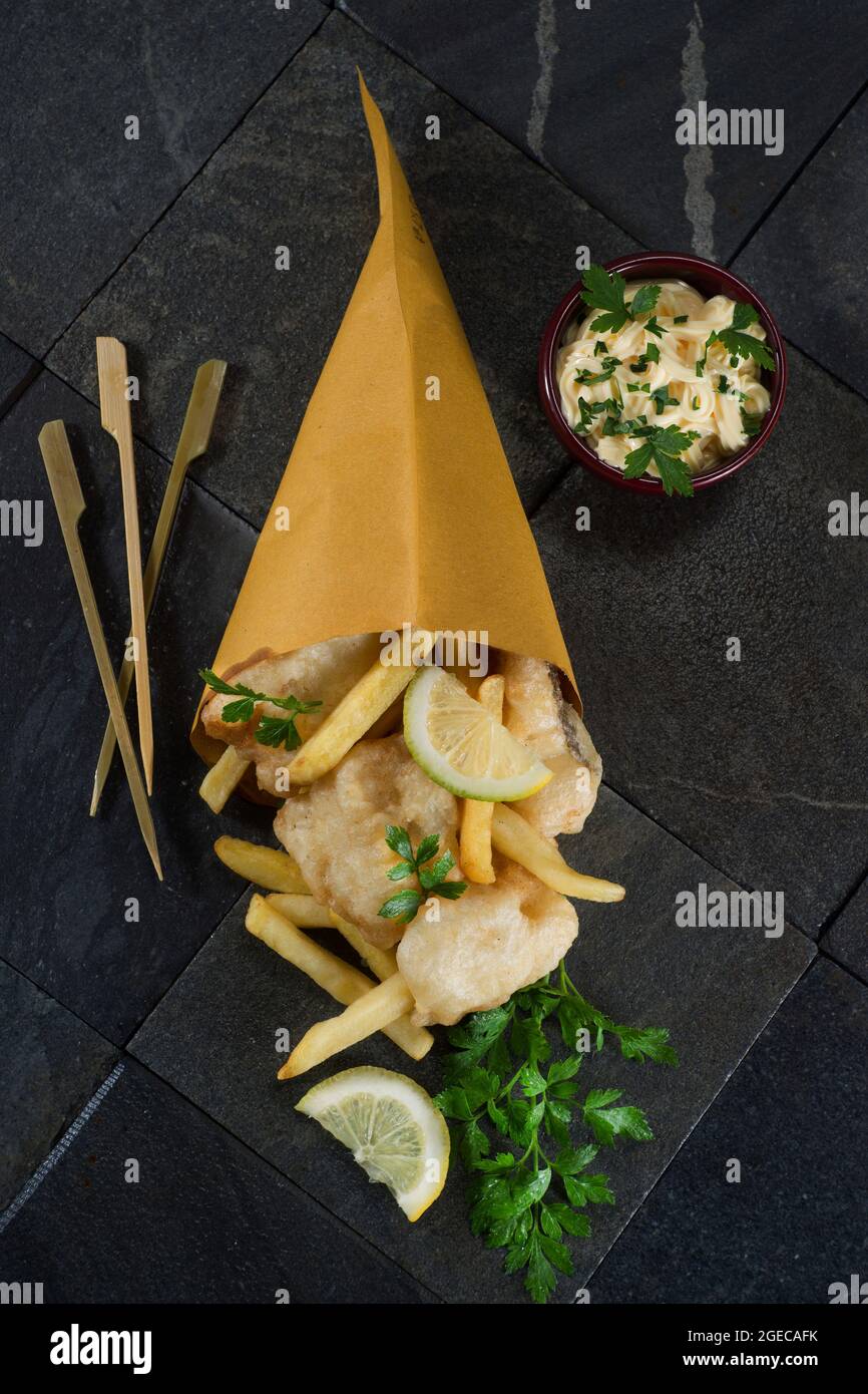 Street food, presentation of portion of cod and french fries Stock ...