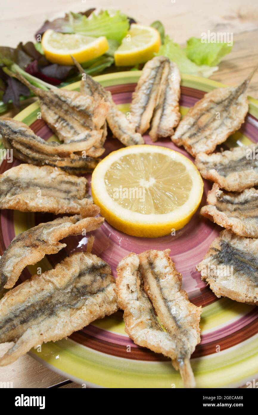 Presentation of a second dish based on frying blue fish Stock Photo - Alamy