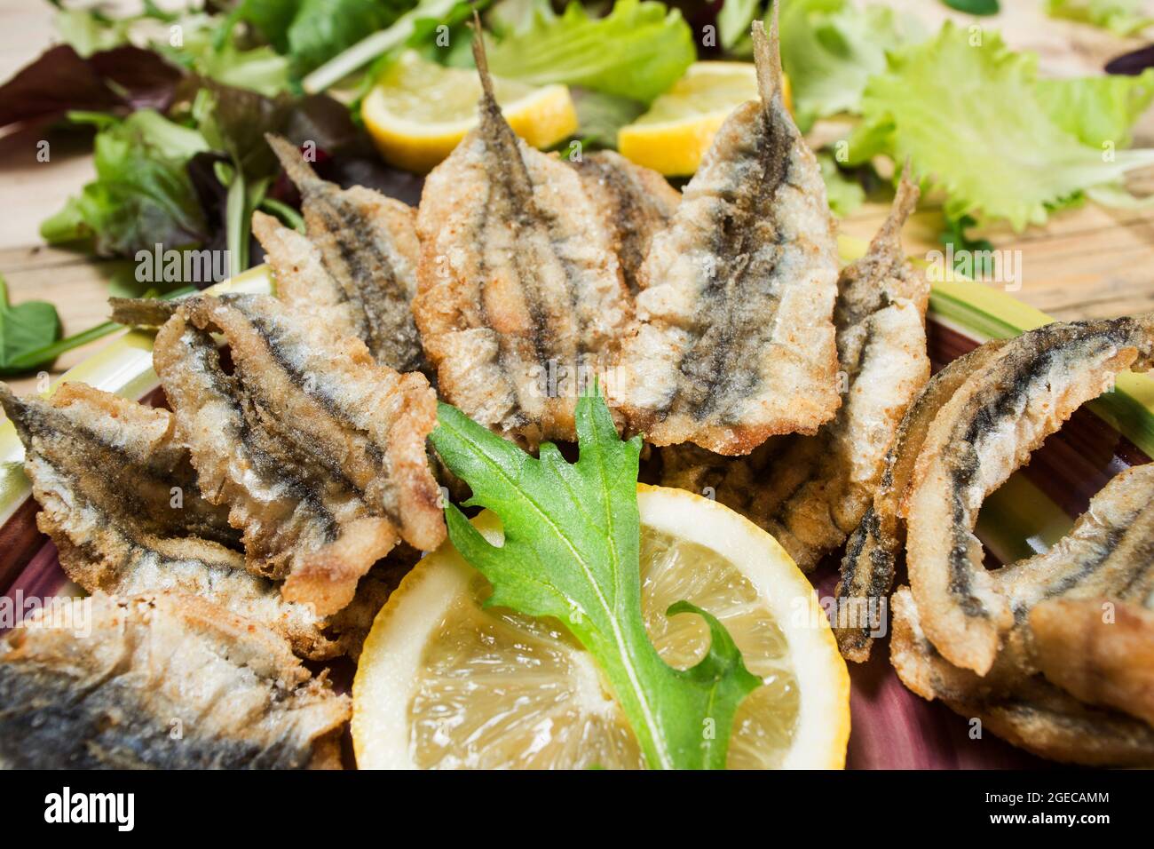 Presentation of a second dish based on frying blue fish Stock Photo - Alamy