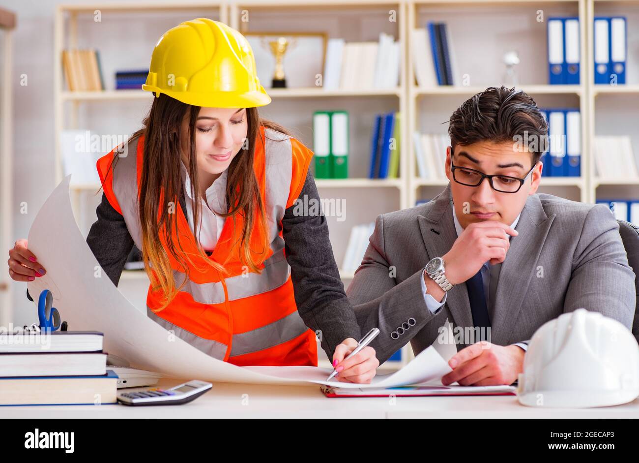 The construction foreman supervisor reviewing drawings Stock Photo - Alamy