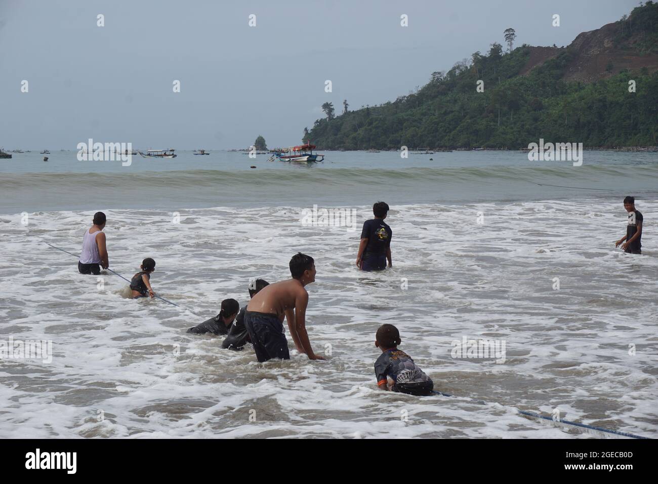 People vacation on Gemah Beach, Tulung Agung, East Java Indonesia Stock ...