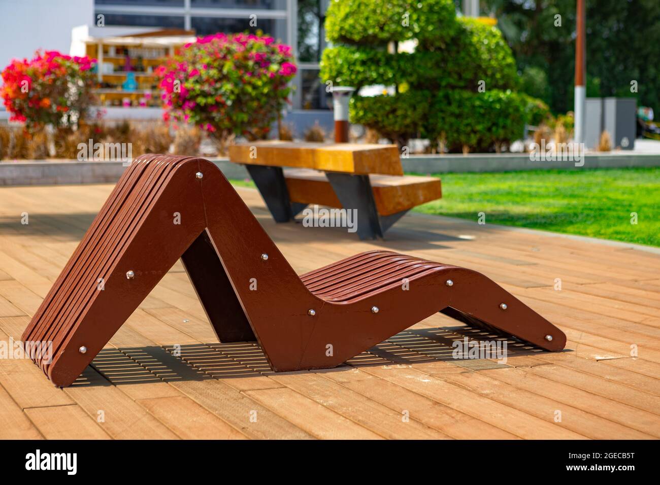 Wooden sun chair on deck at luxury resort Stock Photo - Alamy