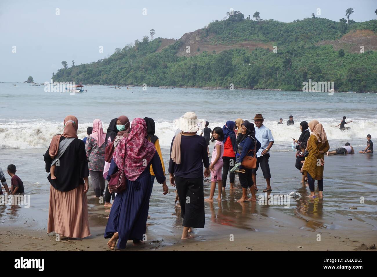 People vacation on Gemah Beach, Tulung Agung, East Java Indonesia Stock ...