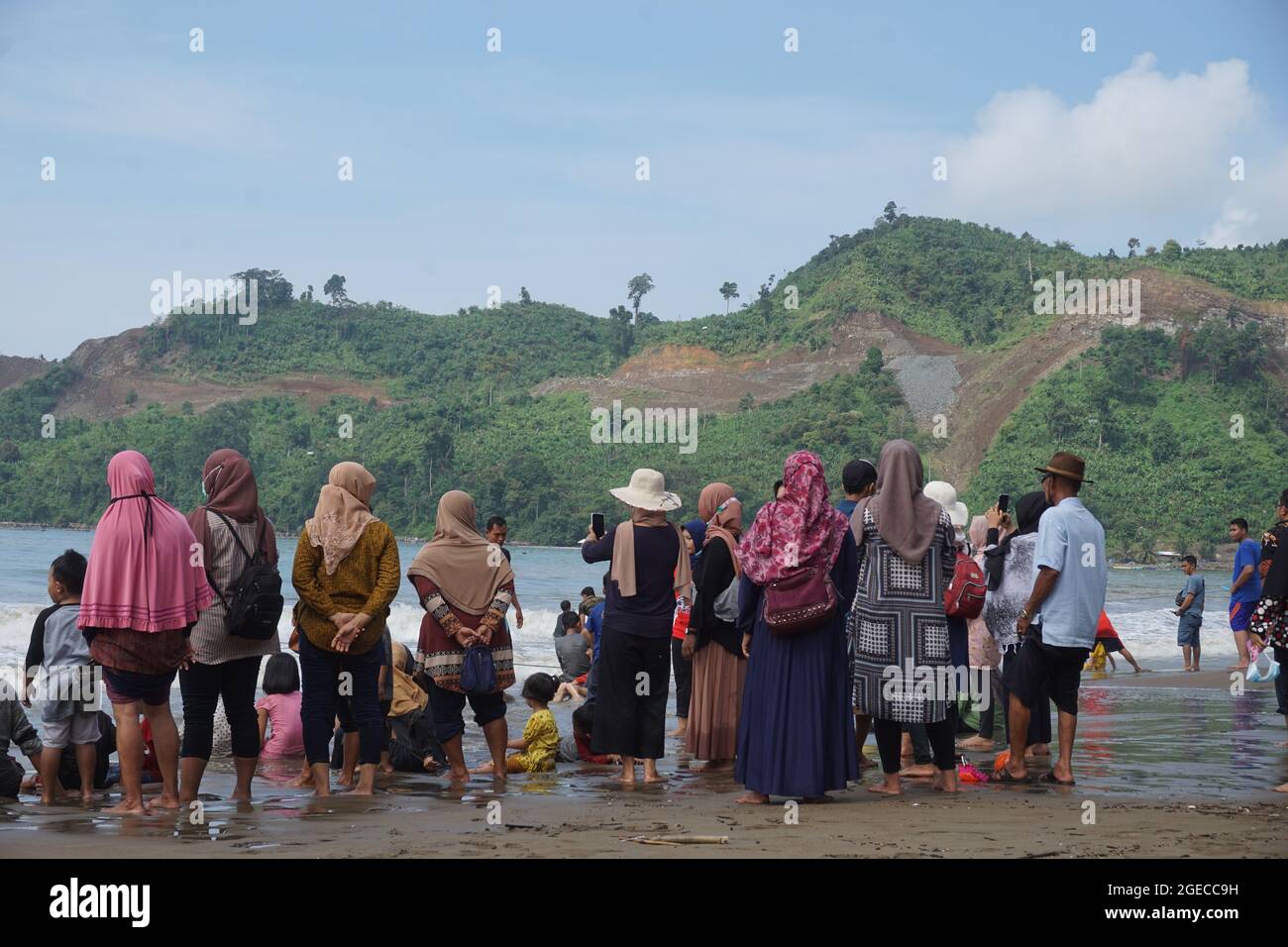 People vacation on Gemah Beach, Tulung Agung, East Java Indonesia Stock ...