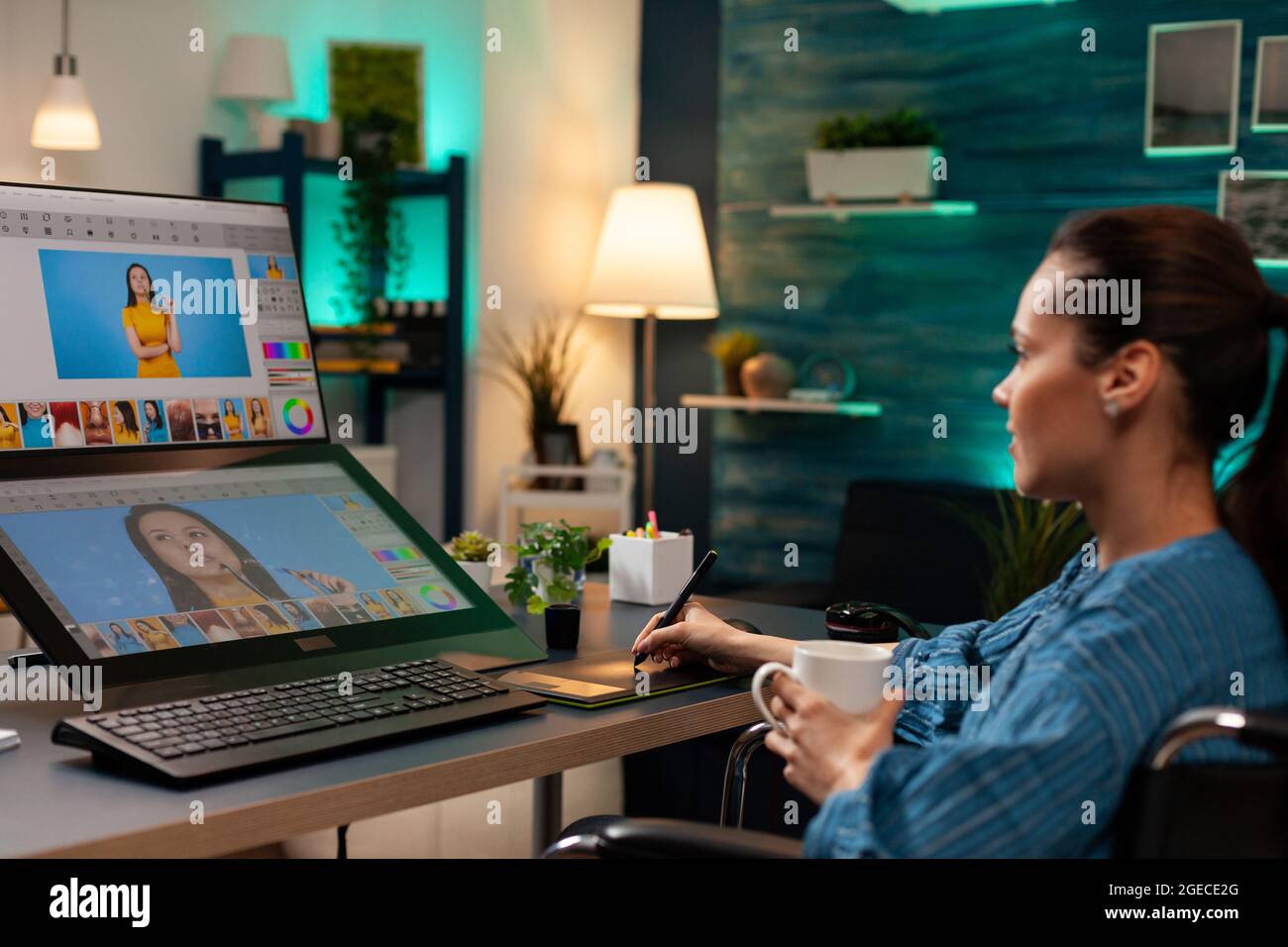 Woman photographer doing retouch work hi-res stock photography and ...