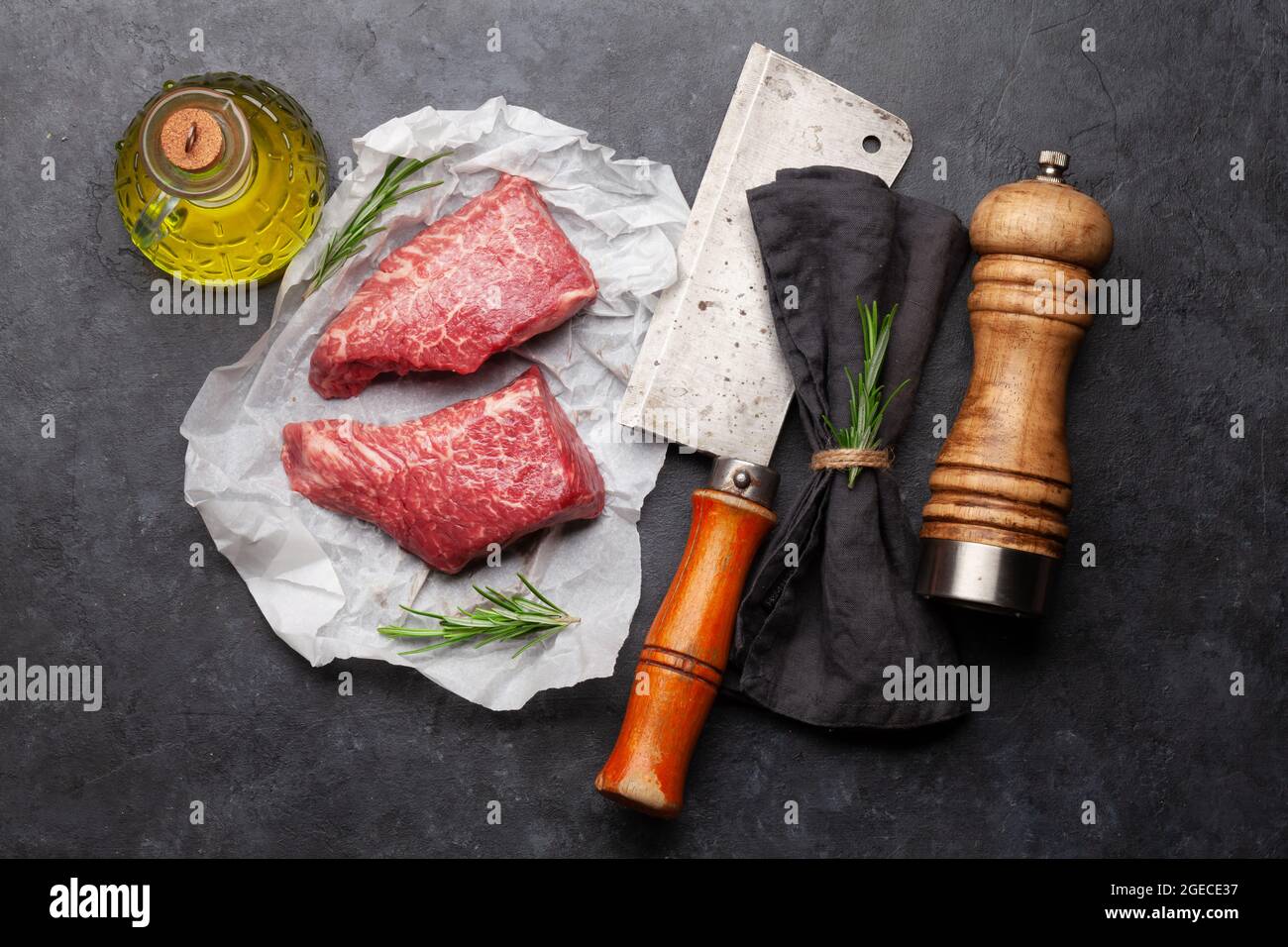 Marbled beef steak. Two fresh raw fillet steaks, herbs and spices. Top ...