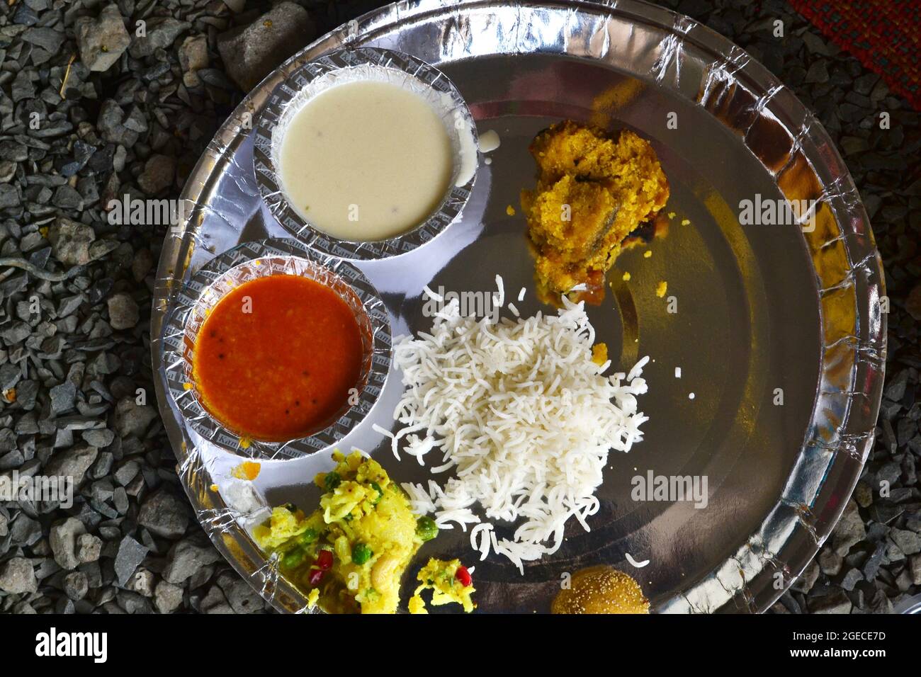 Famous Indian dishes adorned in plates. Silver work plates Stock Photo ...