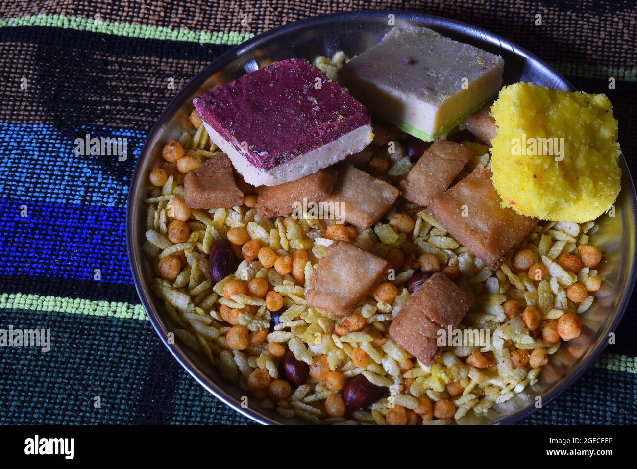 Indian breakfast milk sweets and snacks colorful cloth in the ...