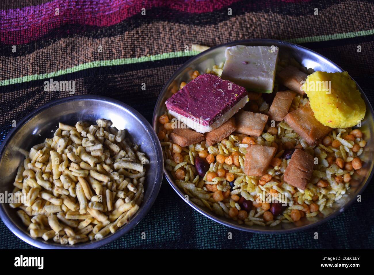 Indian breakfast milk sweets and snacks colorful cloth in the ...