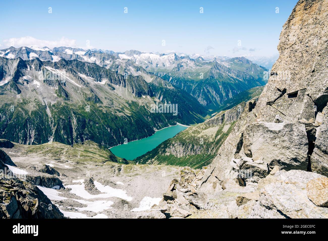 Summer alpine scenery with turquoise blue water reservoir. Zillertal ...