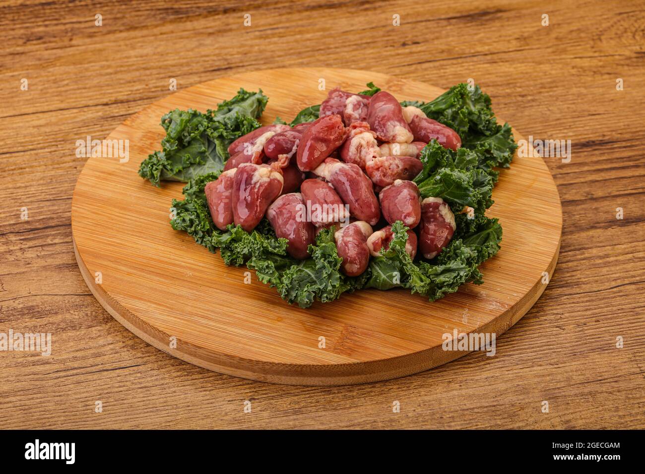Raw chicken hearts heap for cooking Stock Photo - Alamy