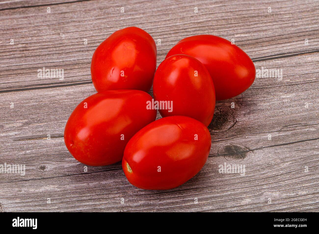 Few Red bright tasty tomato heap Stock Photo - Alamy