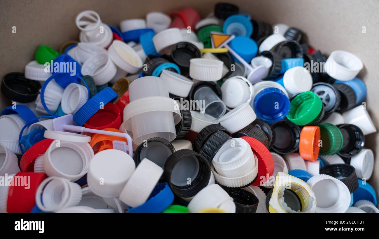 A close-up of many plastic bottle caps collected for recycling Stock ...