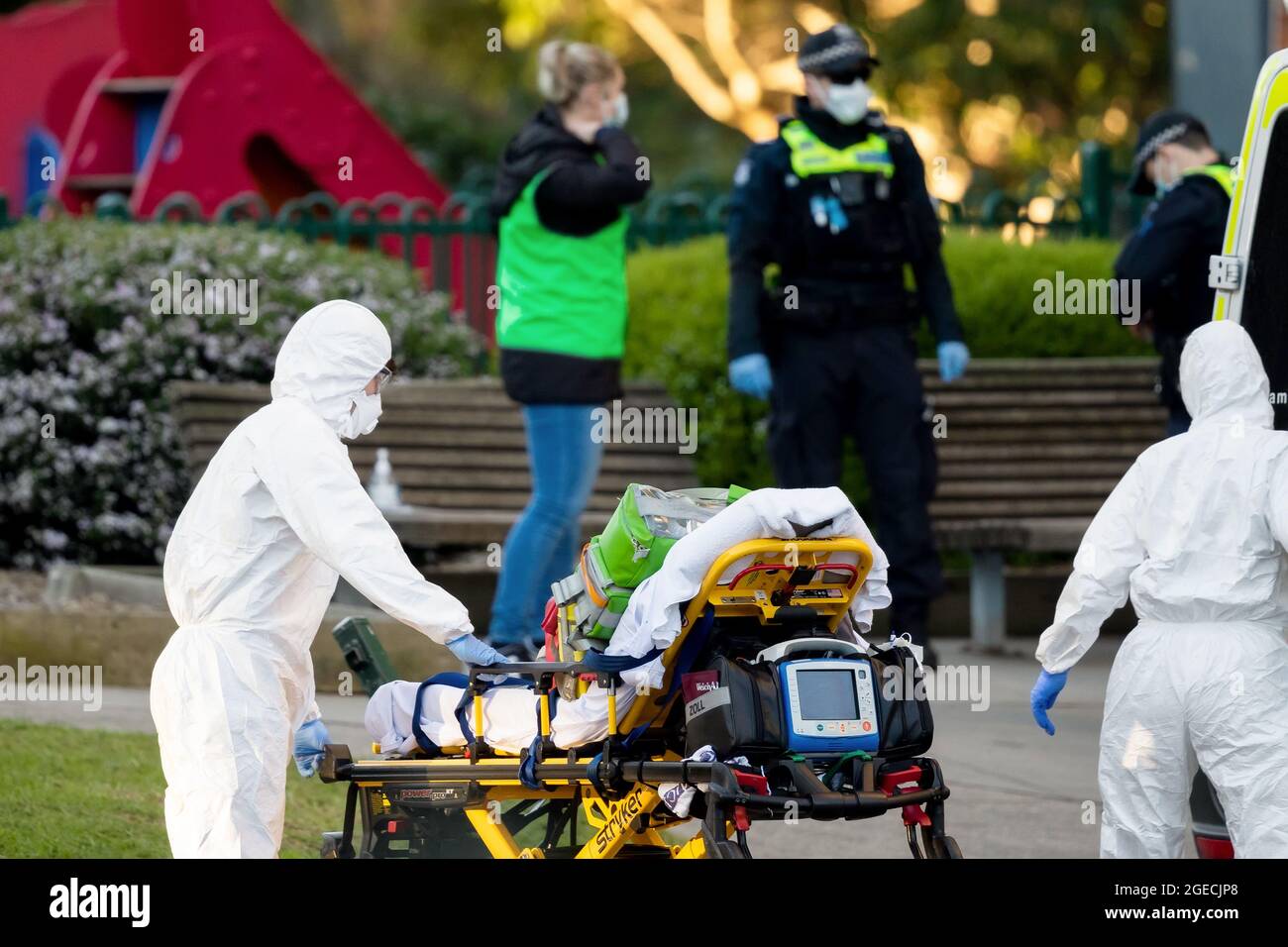 Melbourne, Australia, 8 July, 2020. Paramedics wearing full PPE take a ...