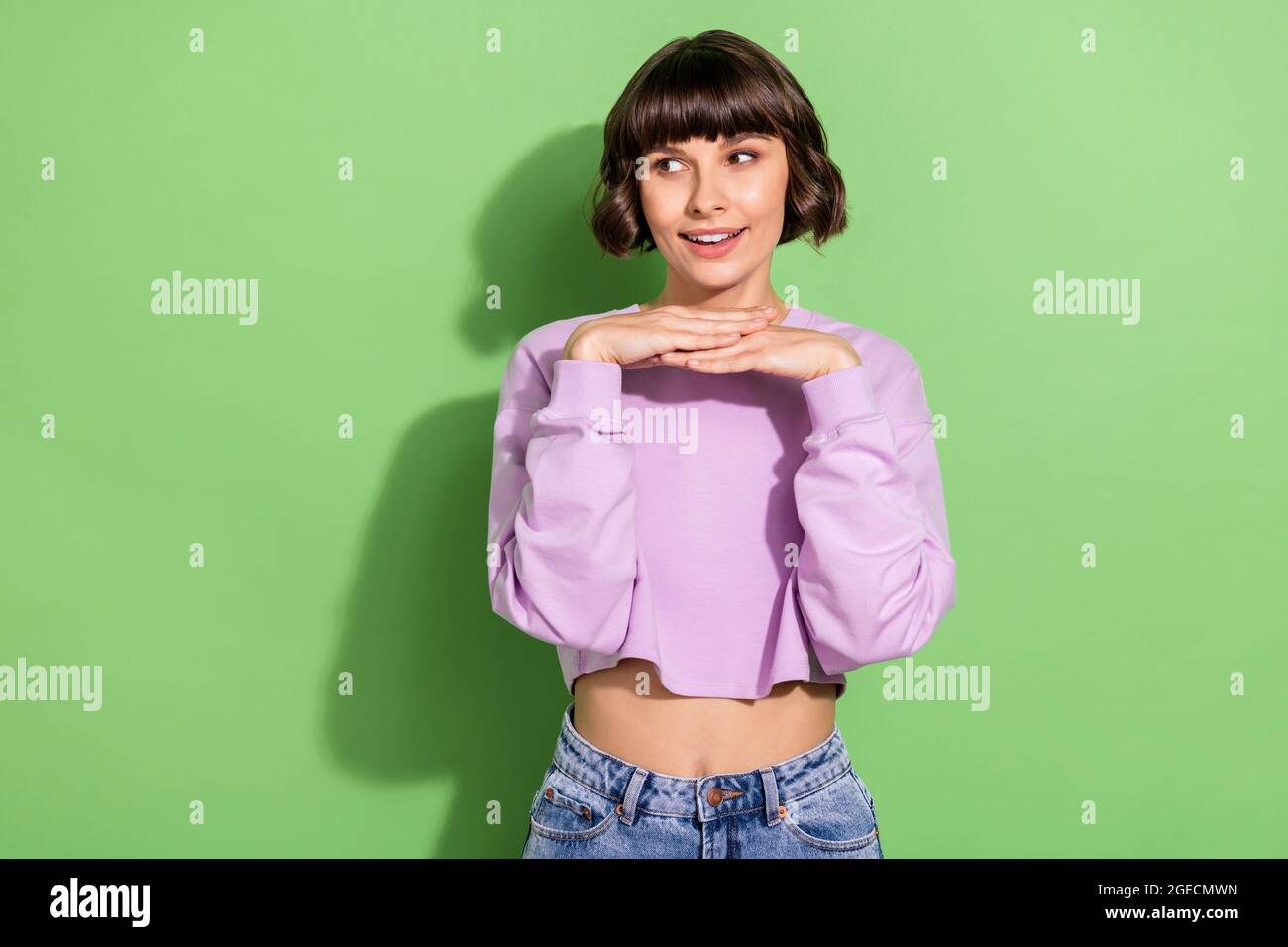Portrait of attractive bewildered girl thinking looking aside copy ...