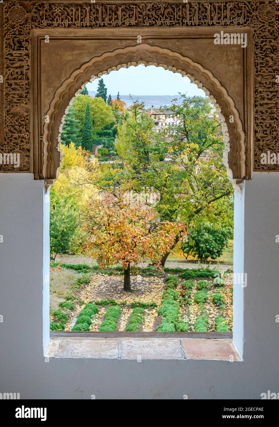 Arched window overlooking the garden. Alhambra Palace, Granada, Spain ...