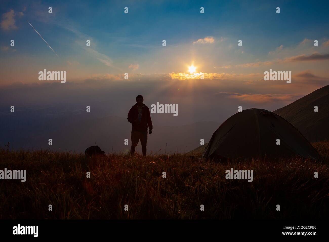 Inspirational sunrise. Man in beautiful inspiring sunrise with ...