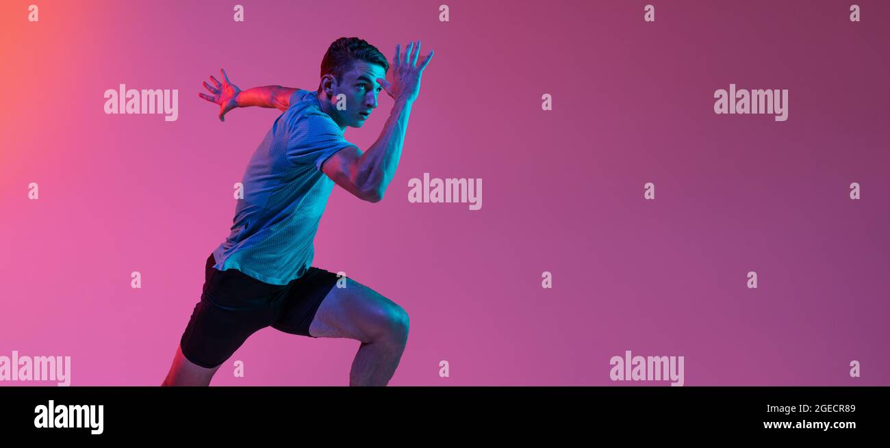 One Caucasian professional male athlete, runner training isolated on ...